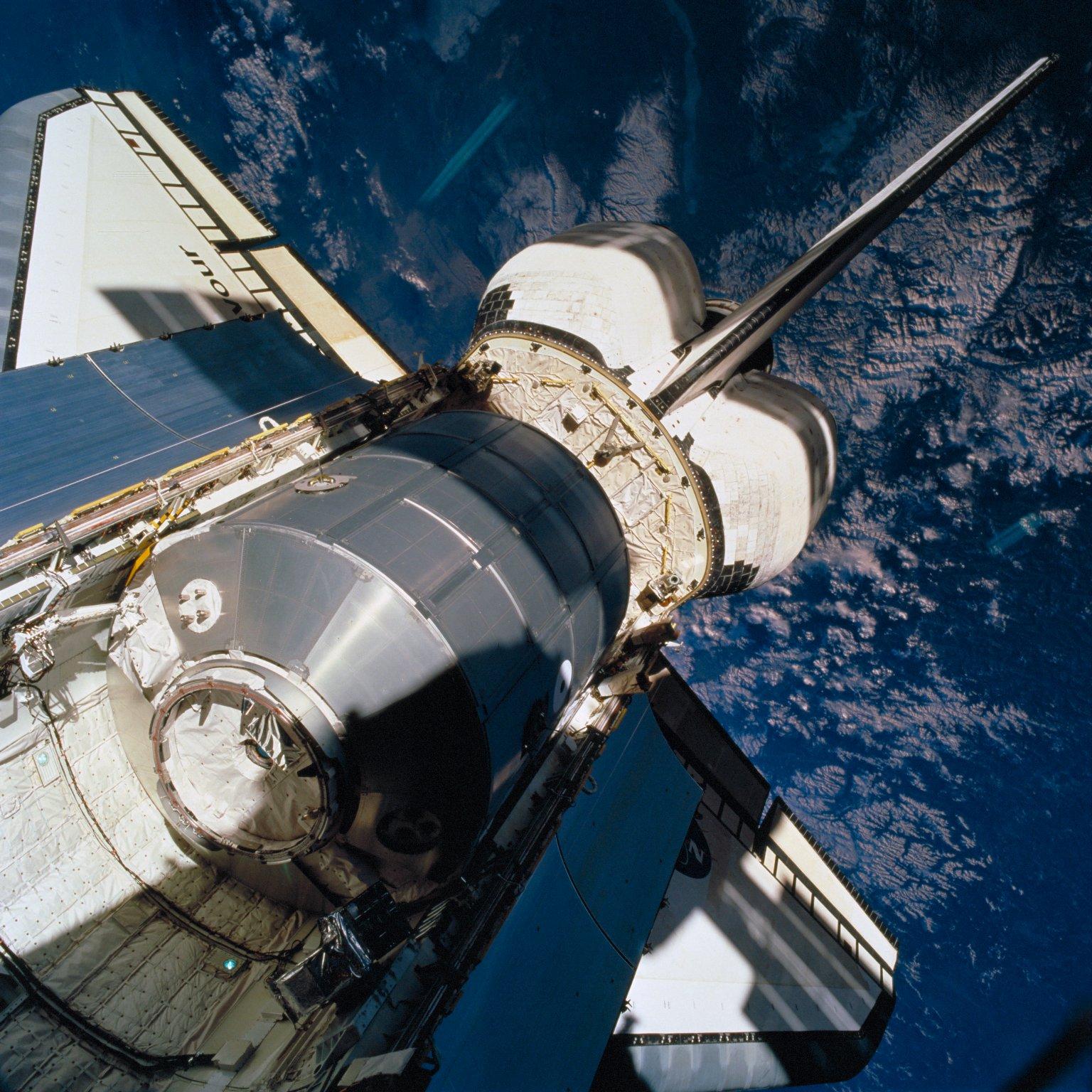STS-100 orbiter Endeavour payload bay with MPLM Raphaello visible ...
